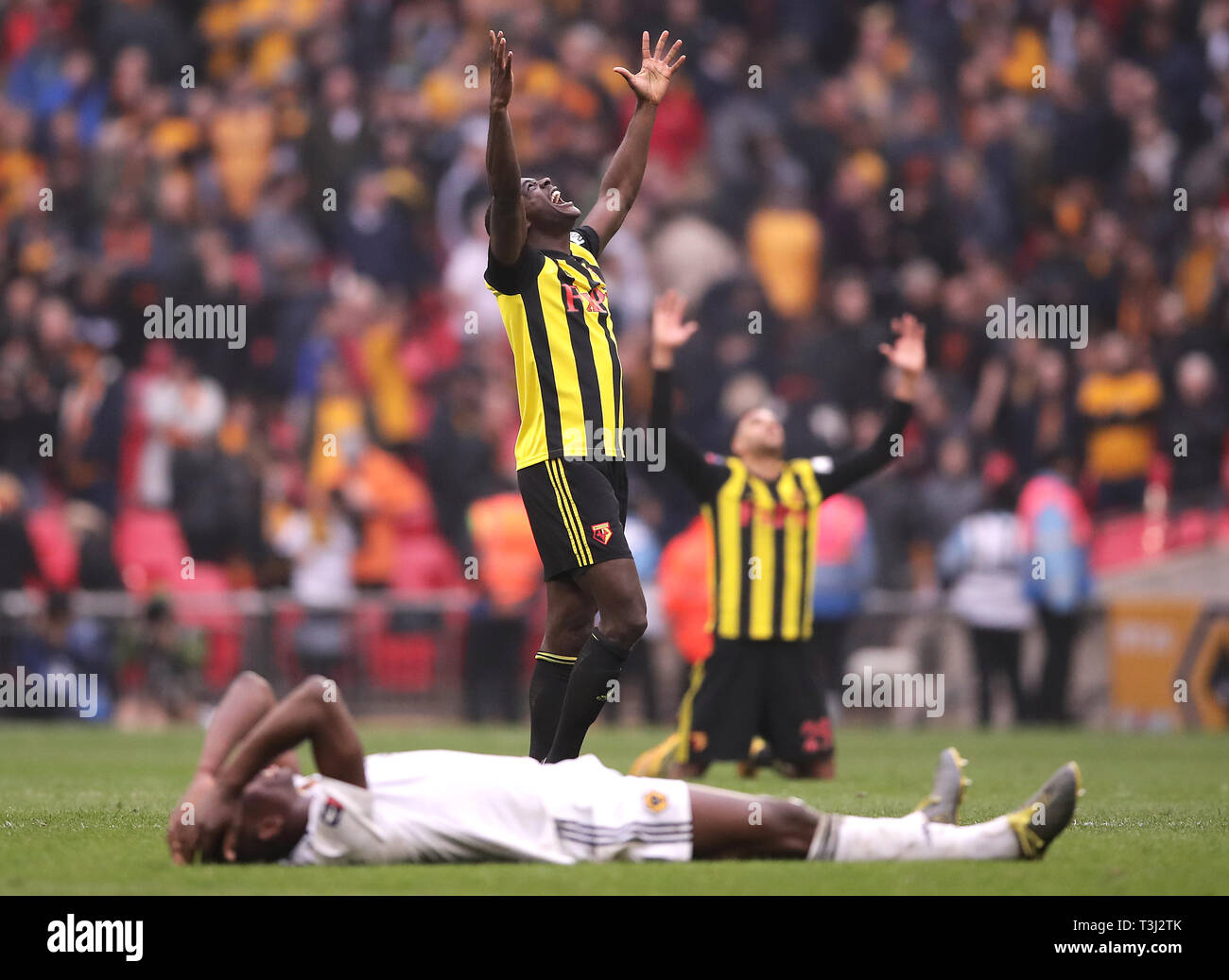 Watford's Ken Sema (centre top) celebrates after the final whistle ...