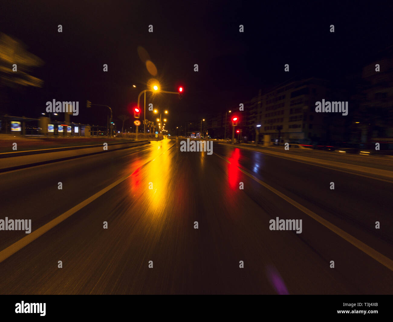 Road from drivers angle at night with red lights Stock Photo - Alamy