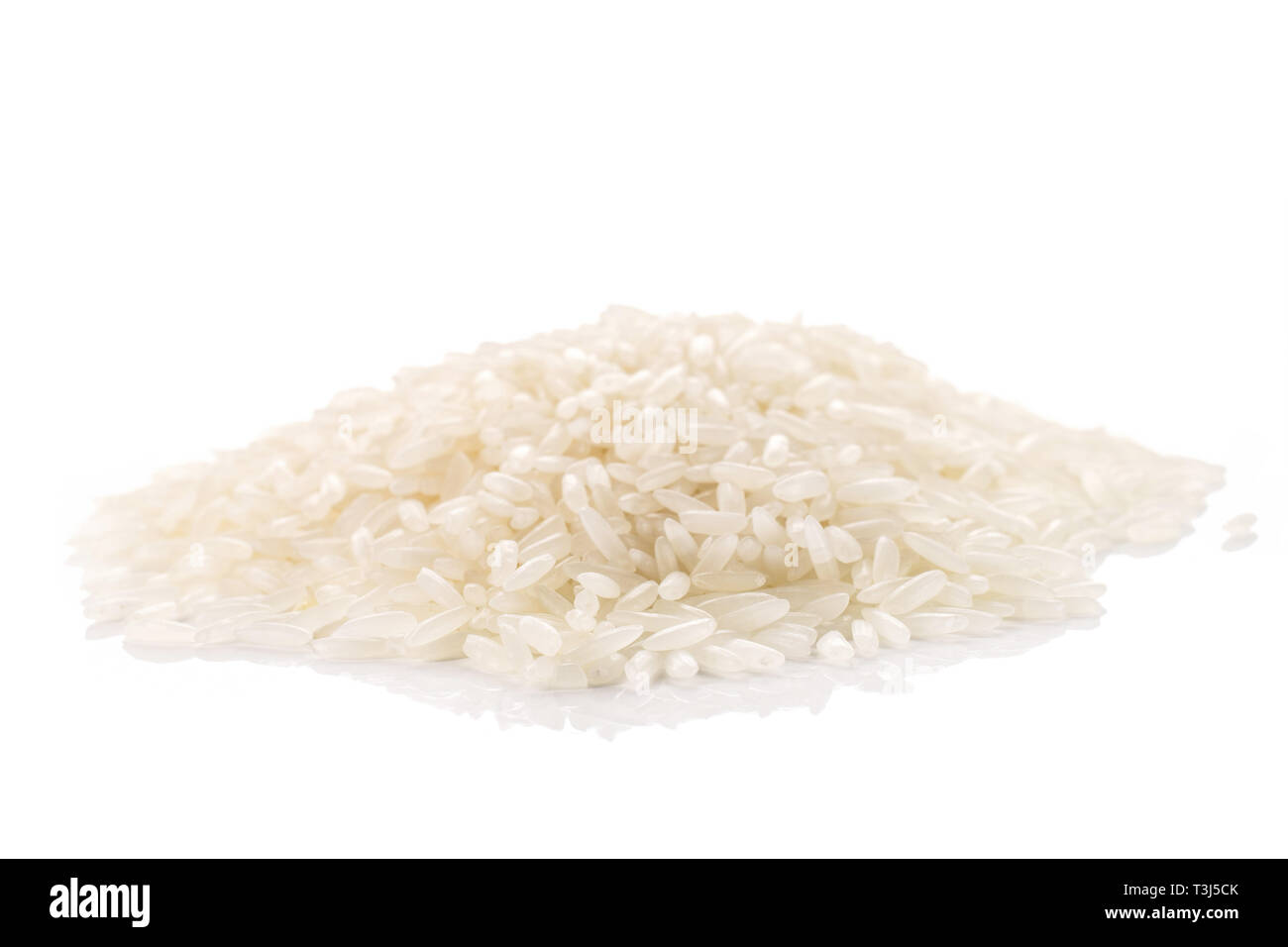 Lot of whole white jasmine rice grains stack isolated on white ...