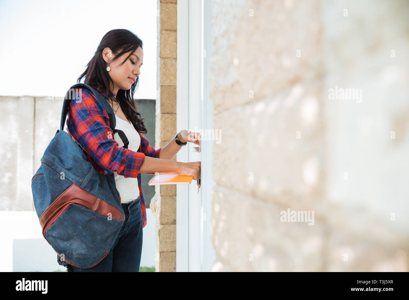 student lock her room before going to college Stock Photo - Alamy