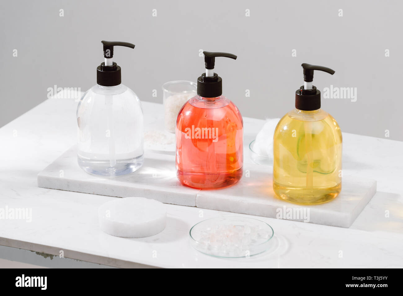 Cosmetic bottles with shower gel, body lotion or shampoo and bath ...