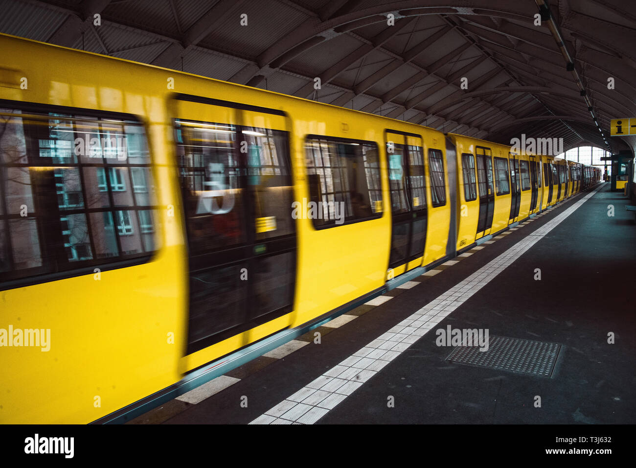 Yellow blurred subway train in Berlin. Public U-bahn transport in ...
