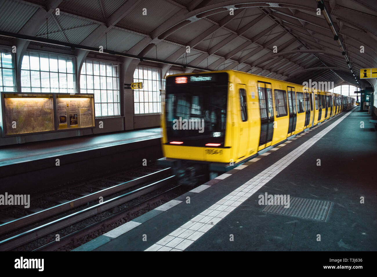 Yellow blurred subway train in Berlin. Public U-bahn transport in ...