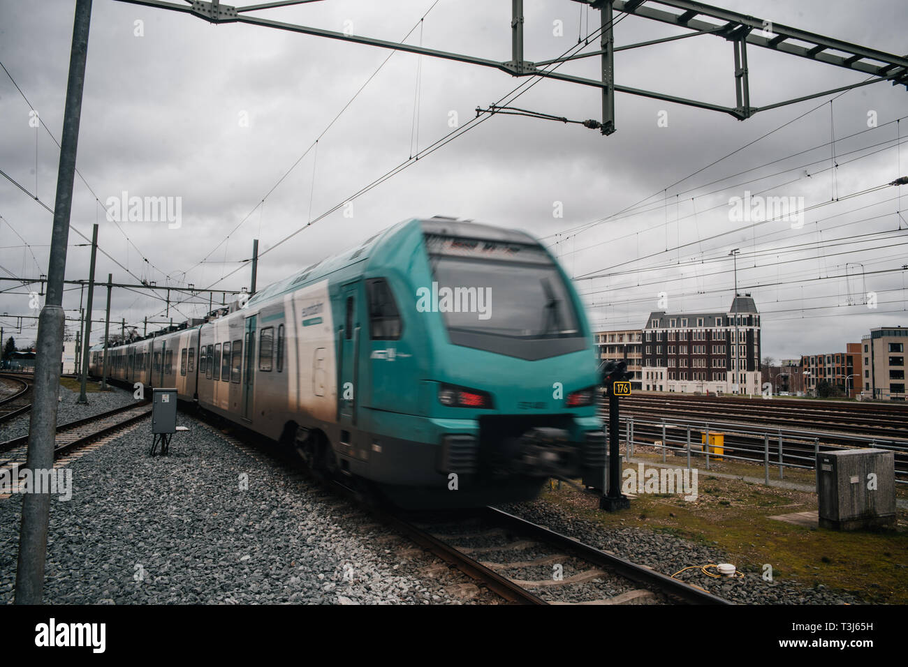 Blurred train motion with high speed at railway station Stock Photo - Alamy