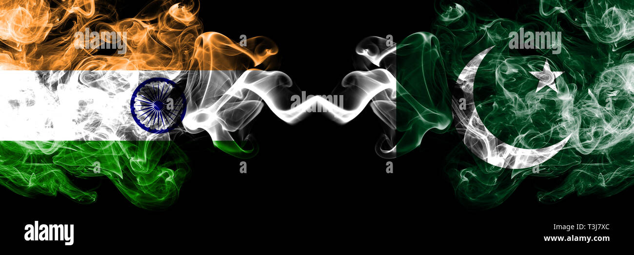 India vs Pakistan, Pakistani smoke flags placed side by side. Thick ...