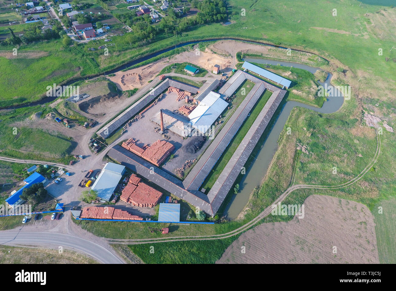 Brick production plant. Top view of a small factory for firing bricks ...
