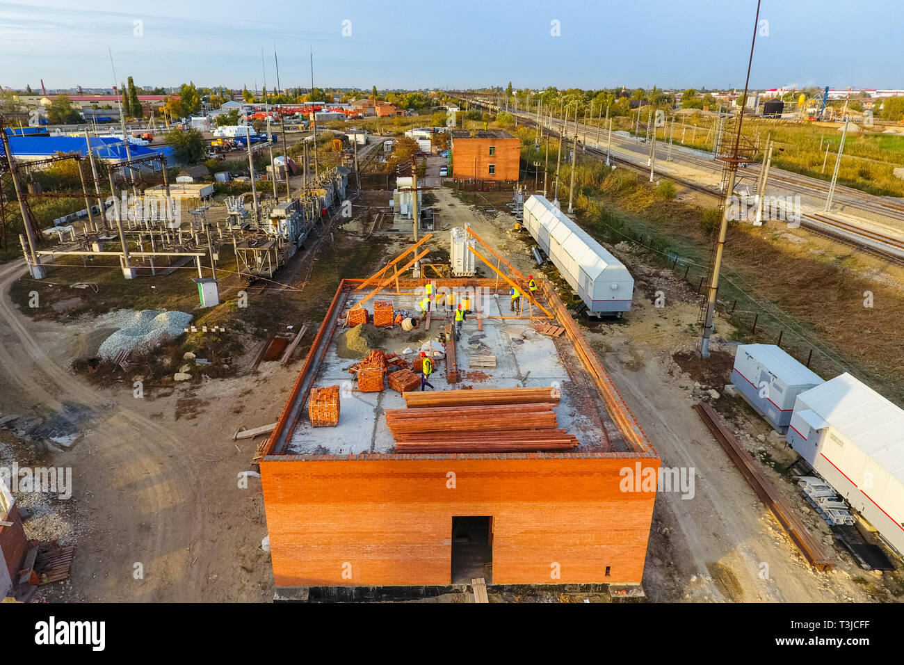 Construction of a brick building. Installation of the roof ...