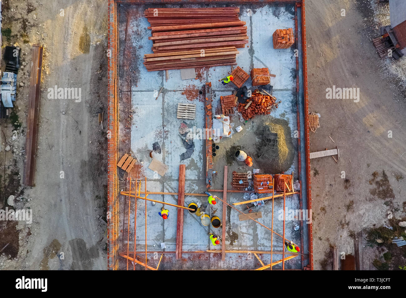 Construction of a brick building. Installation of the roof ...