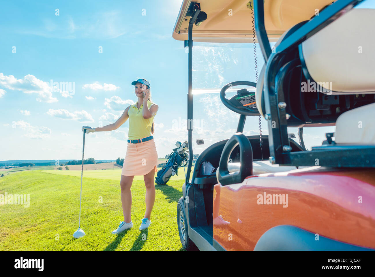 Trendy female golfer hi-res stock photography and images - Alamy