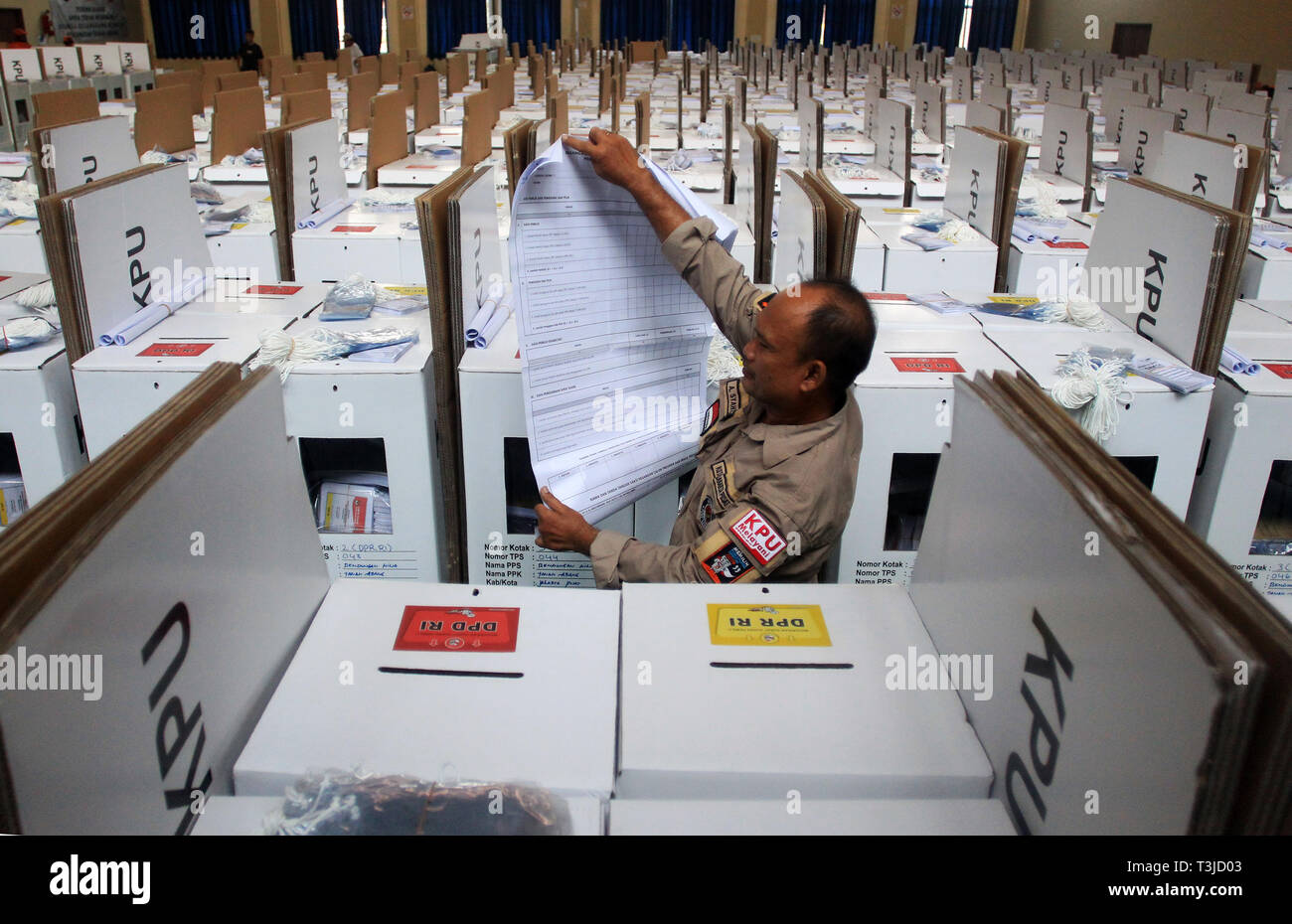 Officers examined ballot papers and ballot boxes before the ...