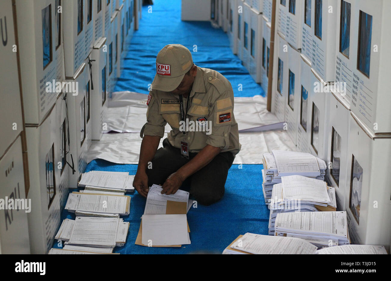 Officers examined ballot papers and ballot boxes before the ...
