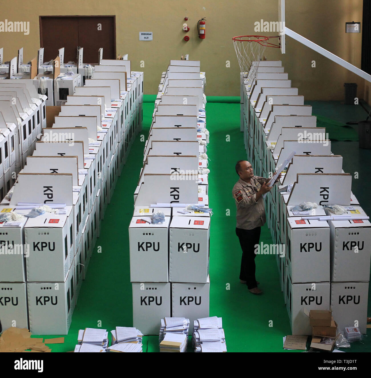 Officers examined ballot papers and ballot boxes before the ...