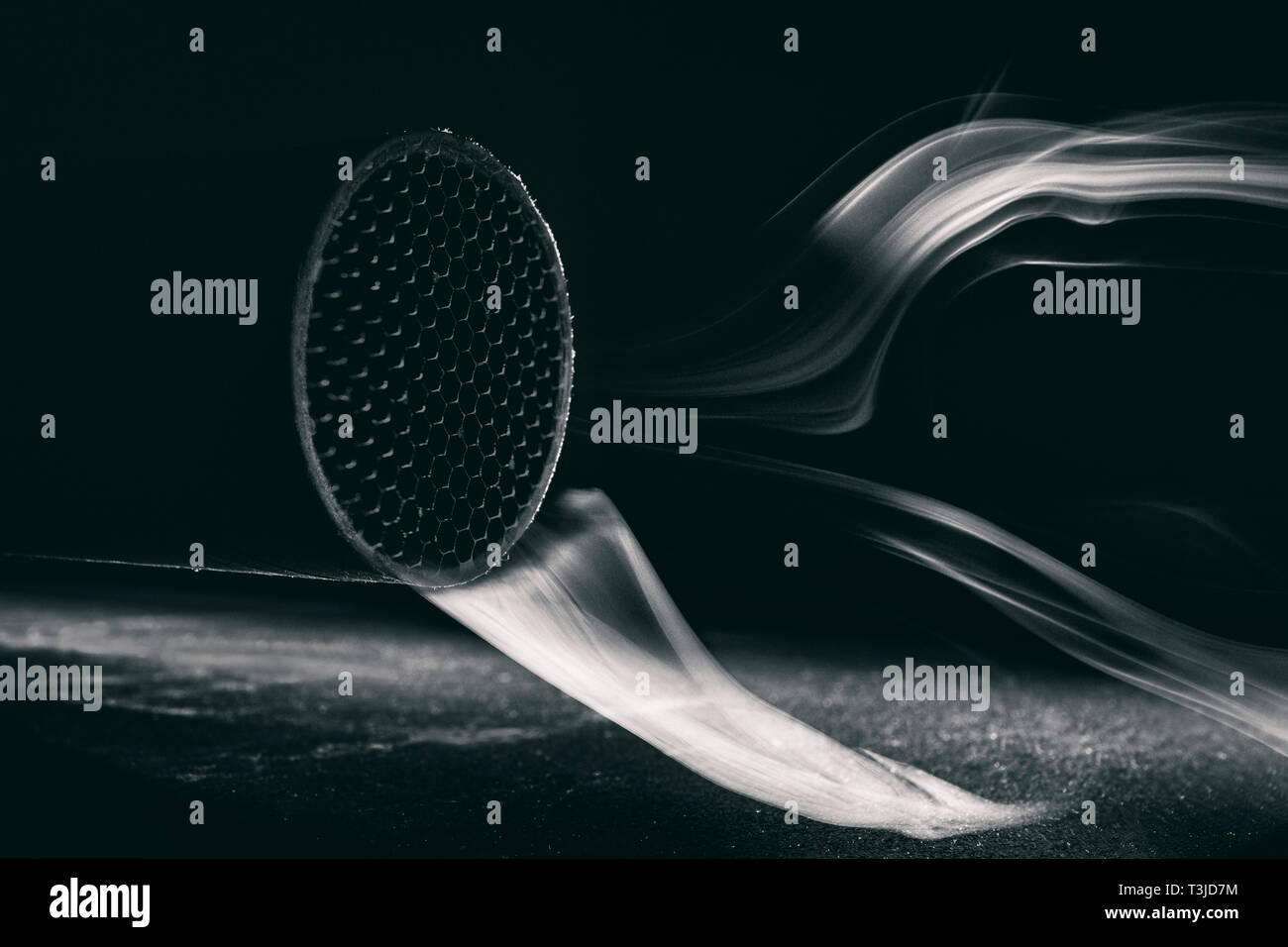 Smoke flowing out of a pipe Stock Photo - Alamy