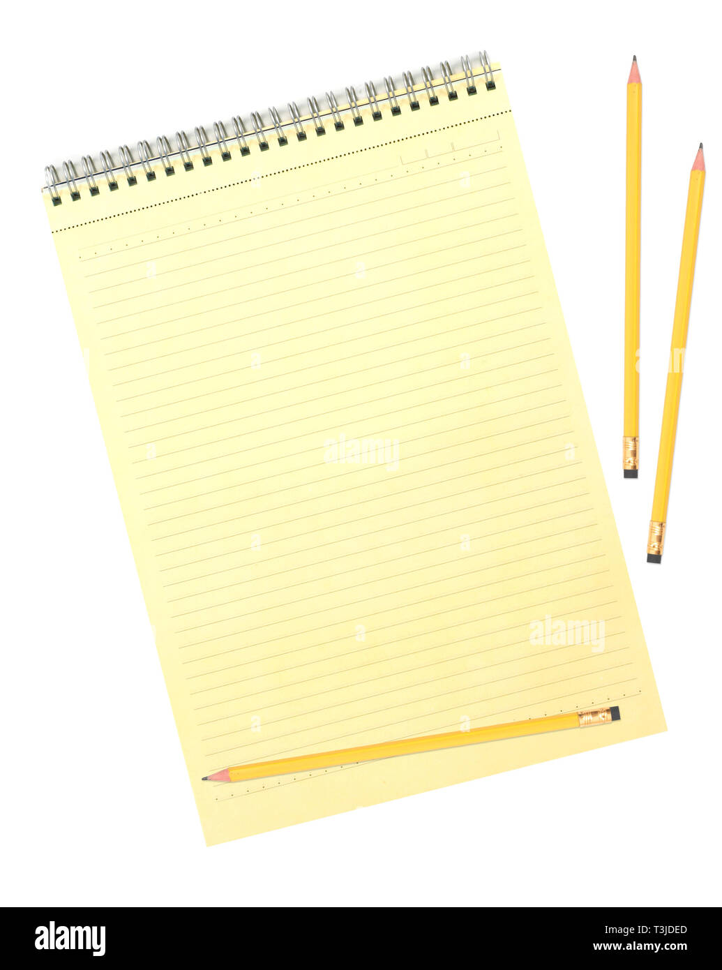yellow notepad with pencils on white background Stock Photo - Alamy