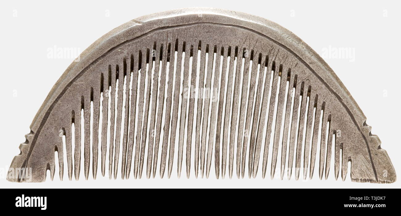 A silver comb, Viking, 9th - 10th century A.D. Arched shape with an ...