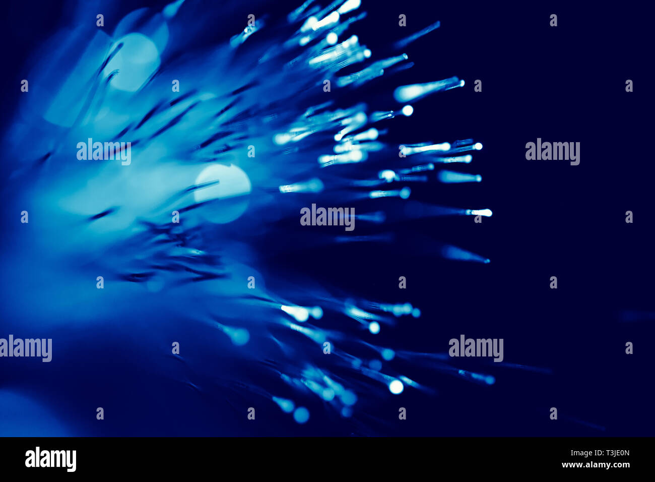 fiber optic cable blue light for super high speed communication tech ...