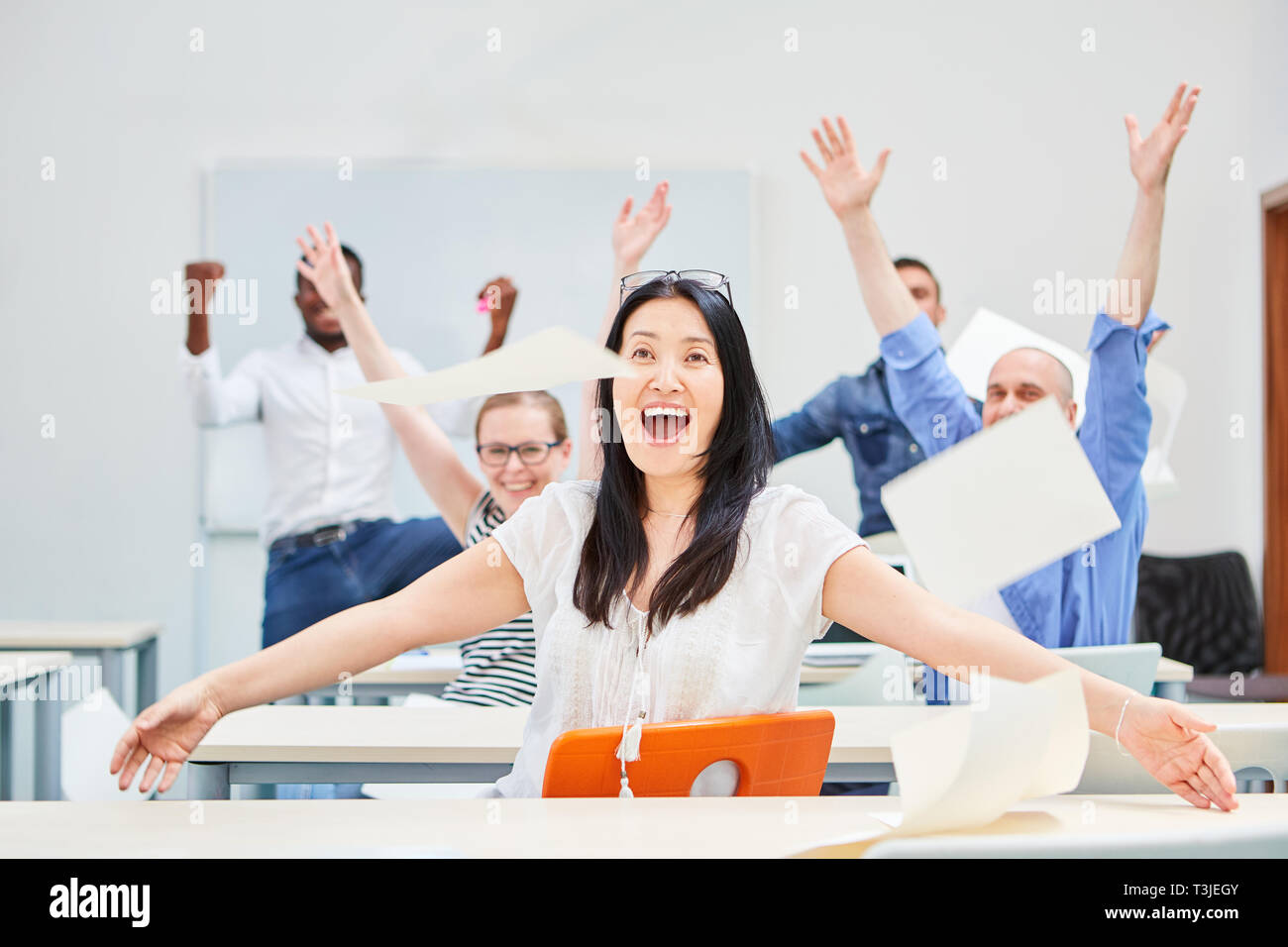 Cheering students group in a seminar after a exam or exam Stock Photo ...