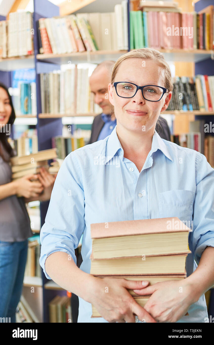Librarian student book hi-res stock photography and images - Alamy