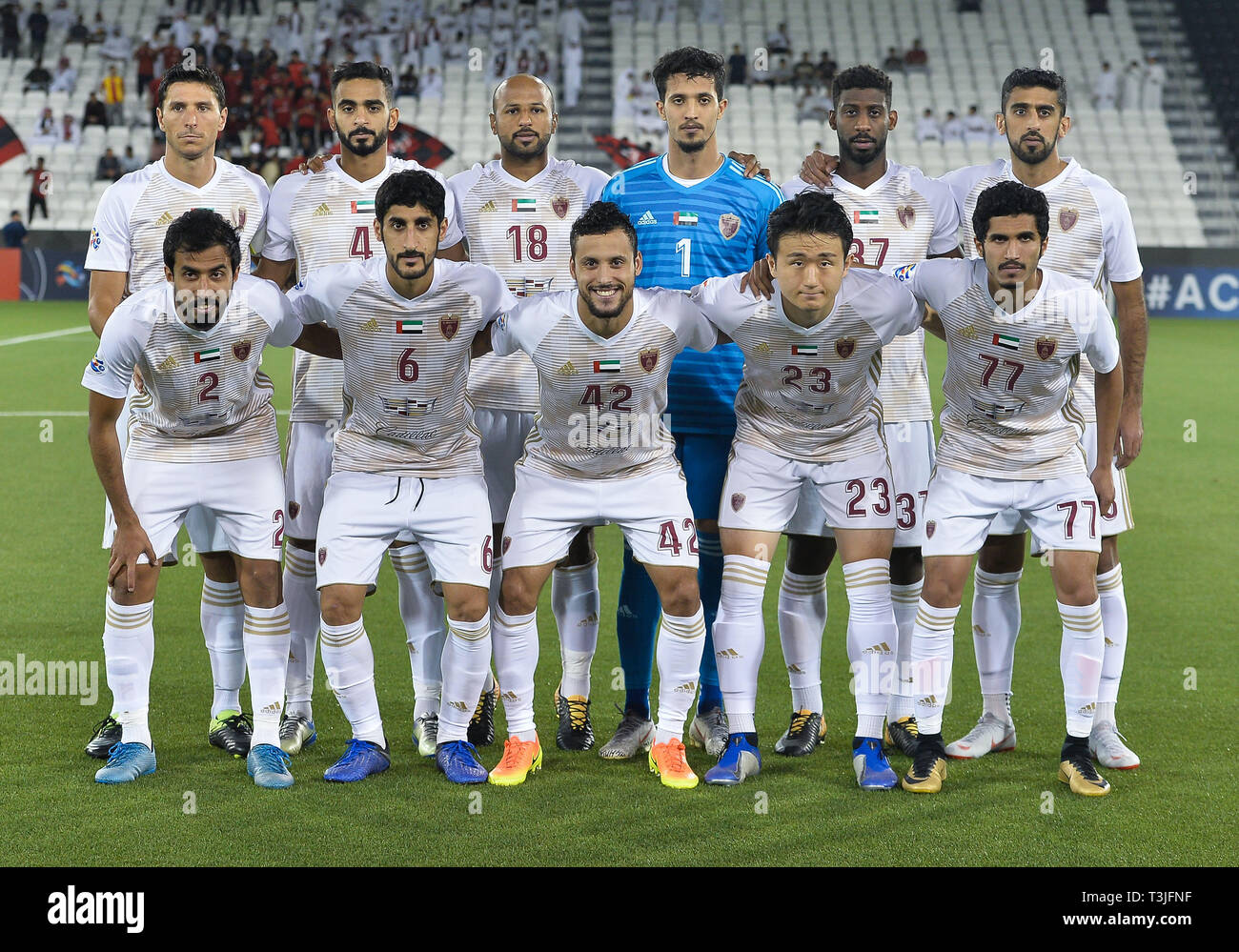 Doha, Qatar. 9th Apr, 2019. Players of Al Wahda FSCC line up before the ...