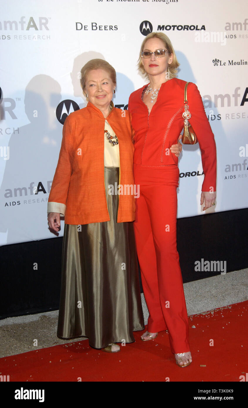 CANNES, FRANCE. May 23, 2002: Actress SHARON STONE (right) with amfAR ...
