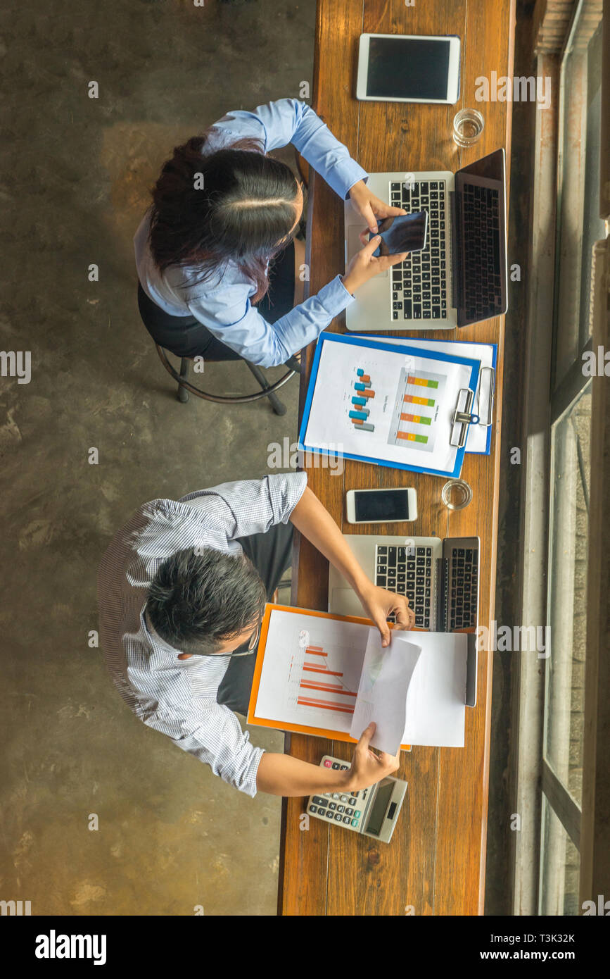 Top view of business people working in the office Stock Photo - Alamy