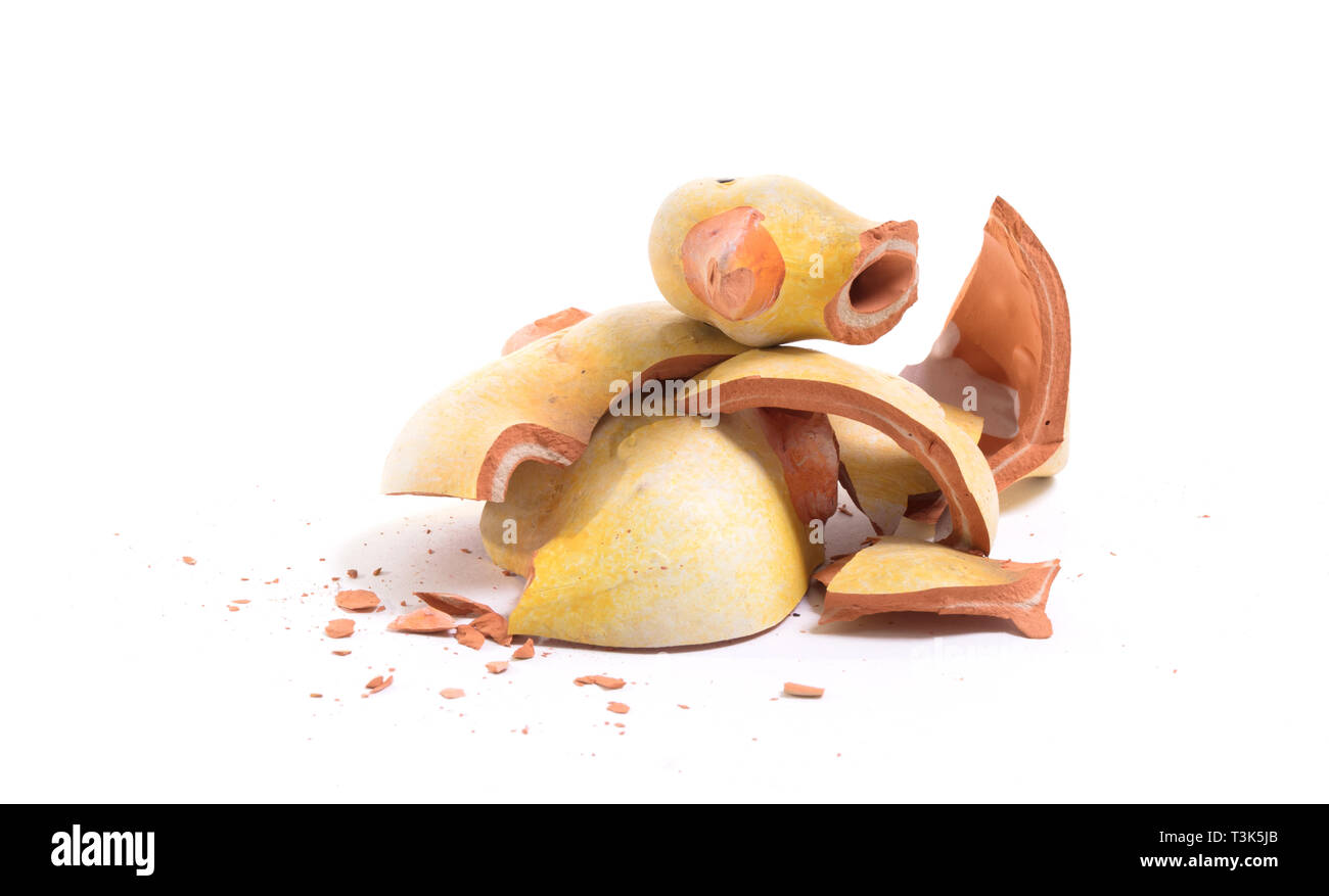 Broken statue of a duckling, isolated on white Stock Photo - Alamy