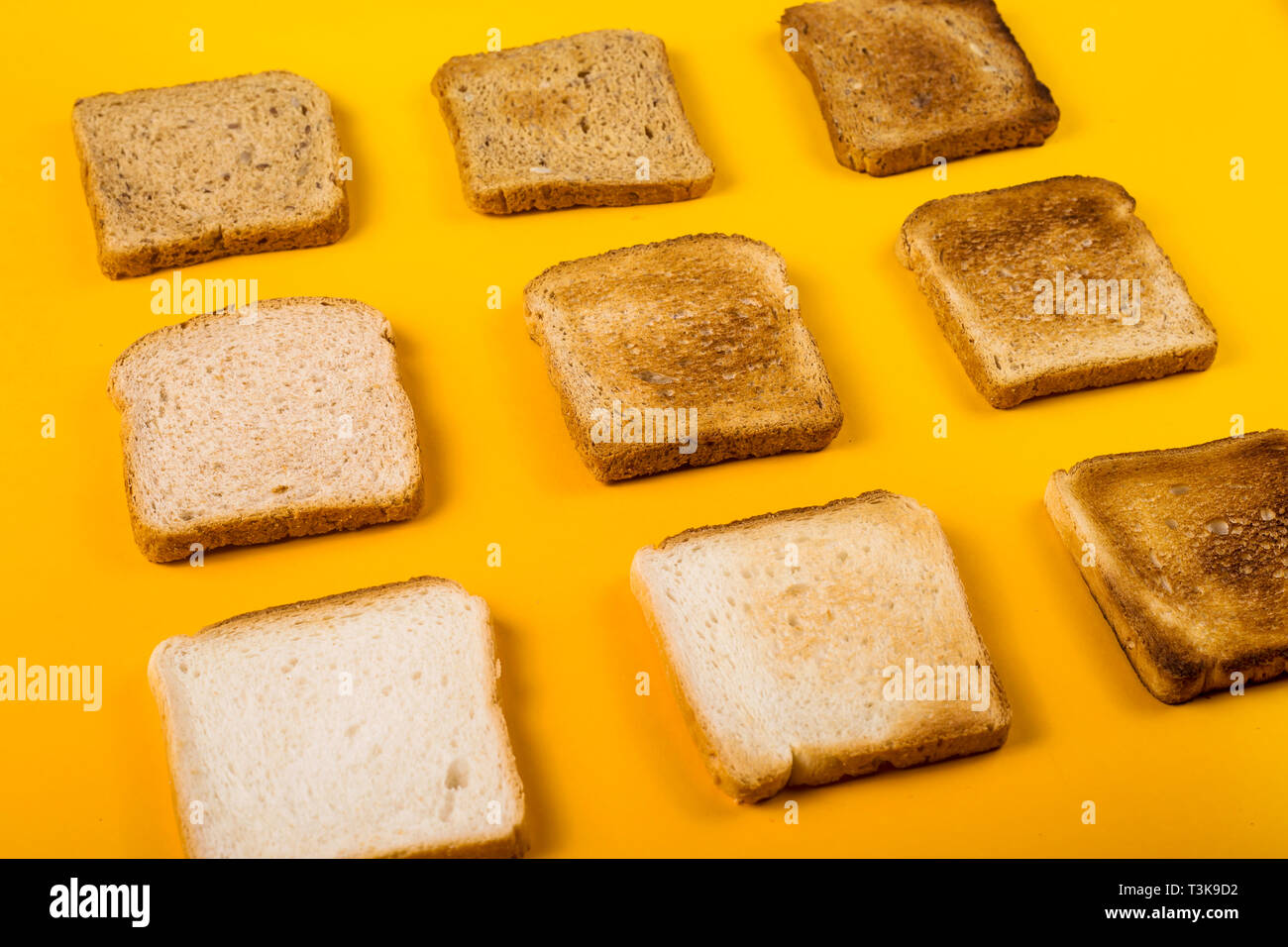 Different types of toast bread and various toasts in a toaster on a ...