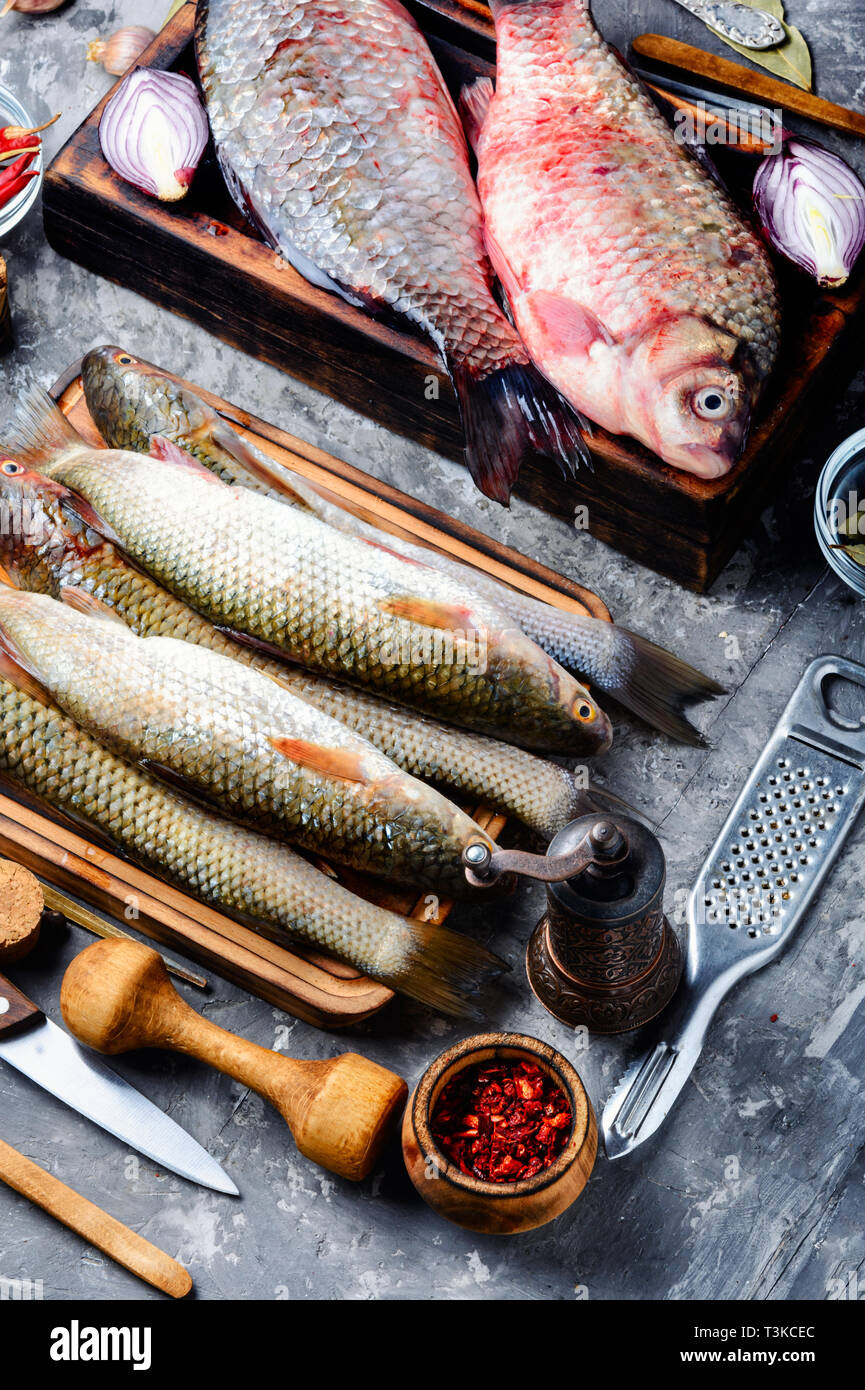 Seafood.Board with fresh fish and spices.Raw fish cooking and ...