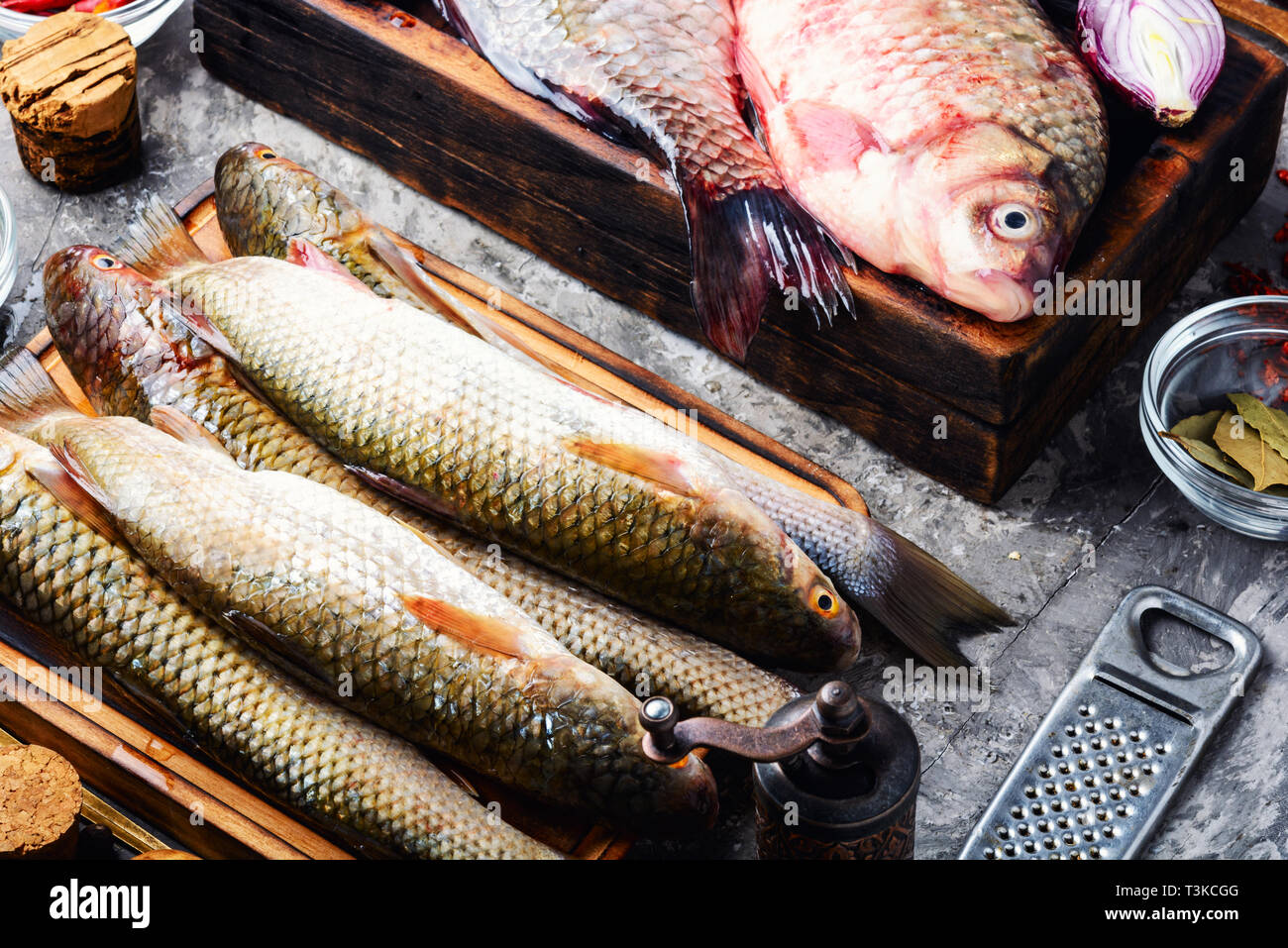 Seafood.Board with fresh fish and spices.Raw fish cooking and ...