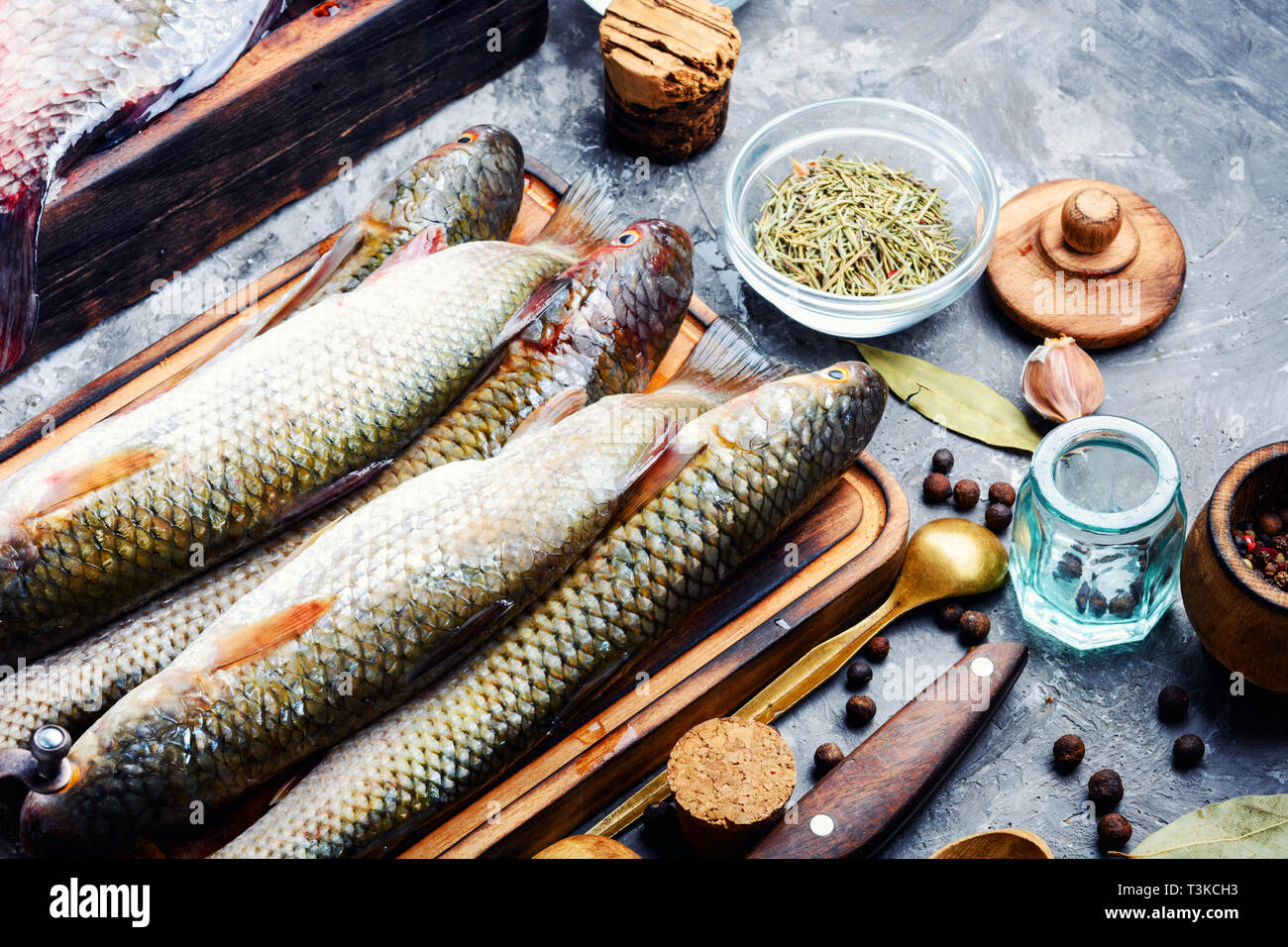 Seafood.Board with fresh fish and spices.Raw fish cooking and ...