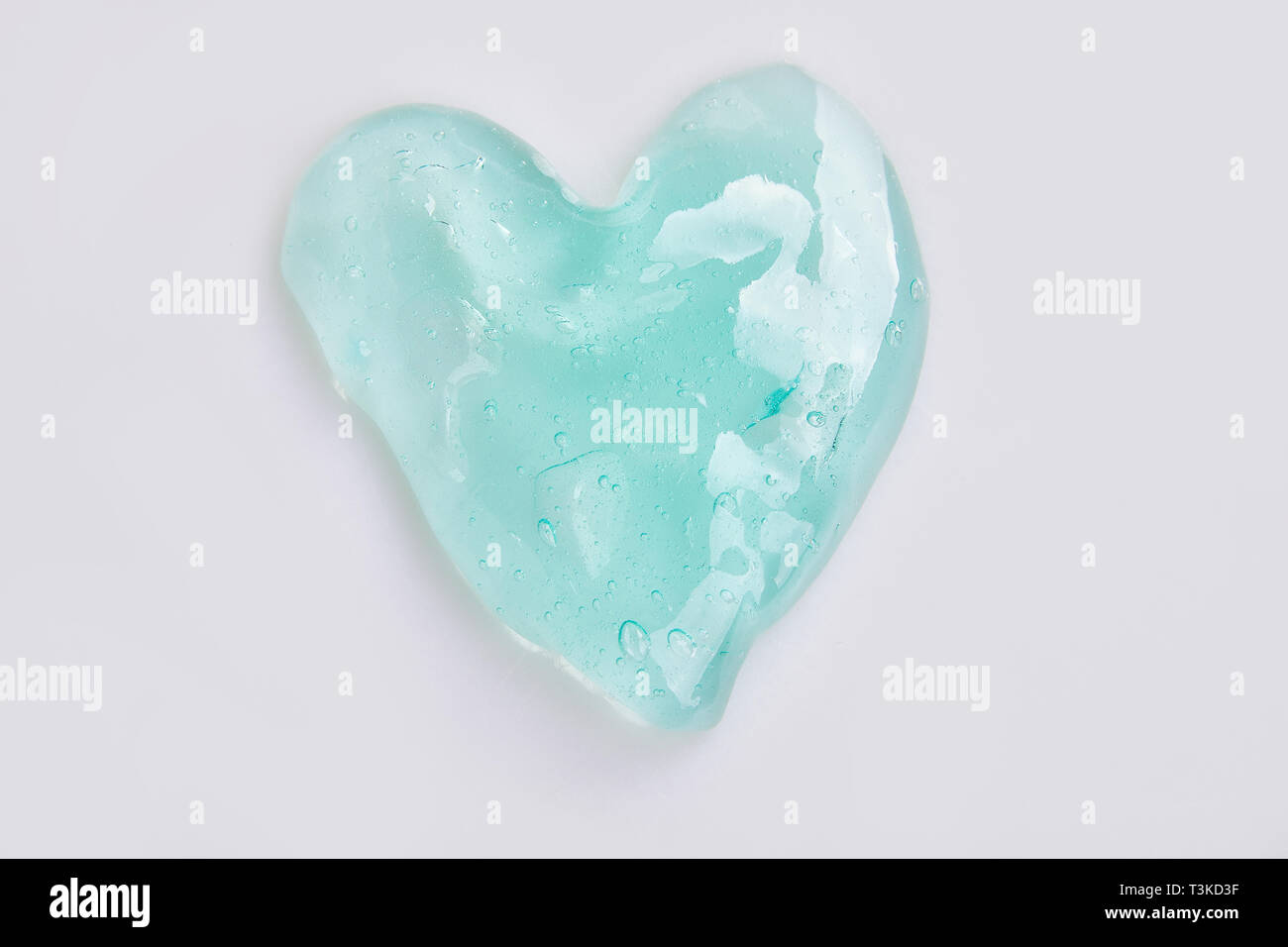 Green slime for kids in a heart shape, transparent funny toy. Isolated ...