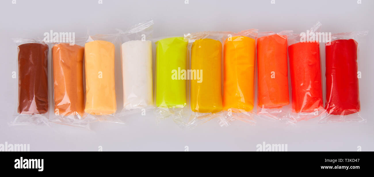 Set of colorful plasticine isolated on a white background. Plasticine ...