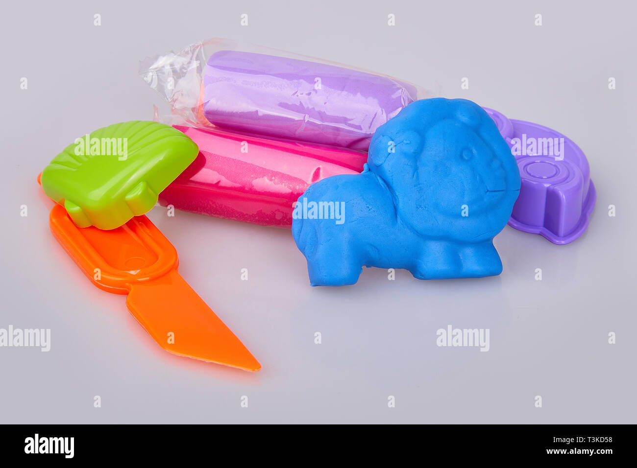 A lion formed from blue play dough (plasticine). Modeling. Play dough ...