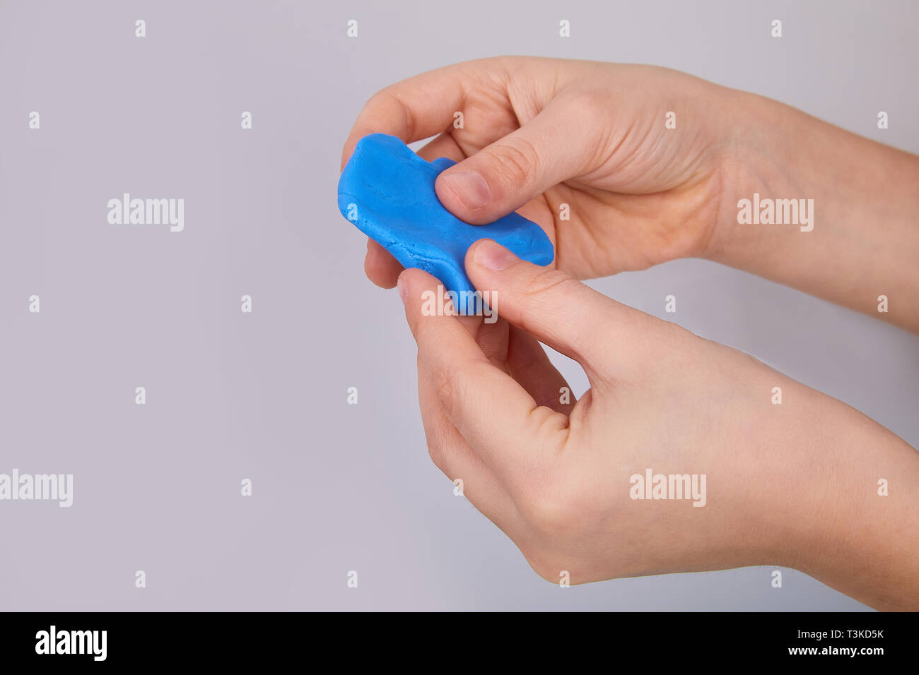 The process of play dough modeling, the child's hands sculpt figures ...