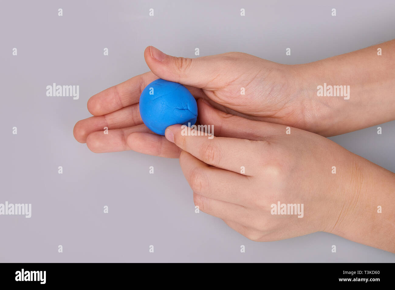 The process of play dough modeling, the child's hands sculpt figures ...