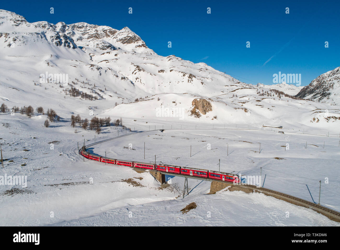 Red train of Bernina on the Rhaetian Railway, UNESCO world heritage ...