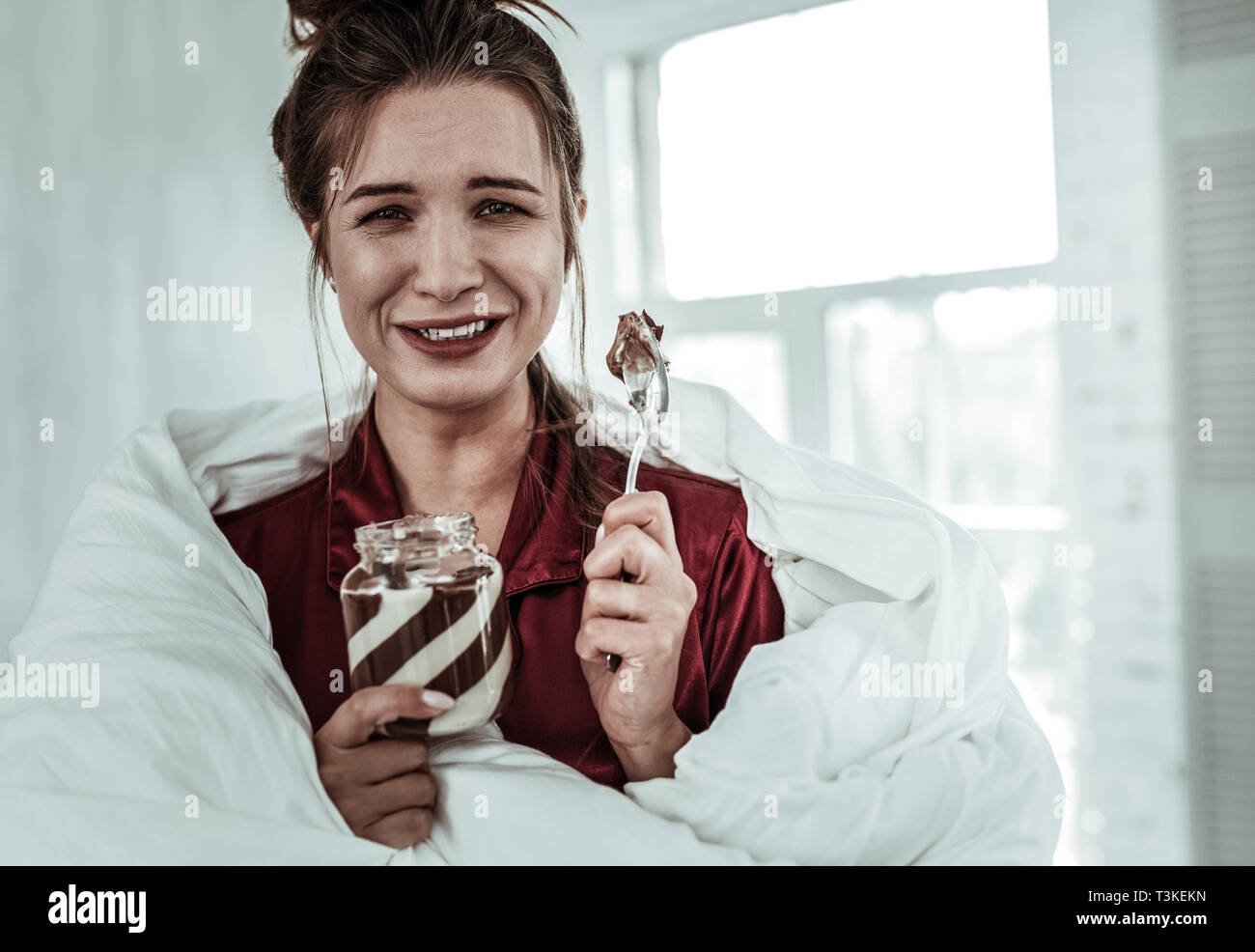 Woman alone home eating loneliness hi-res stock photography and images ...