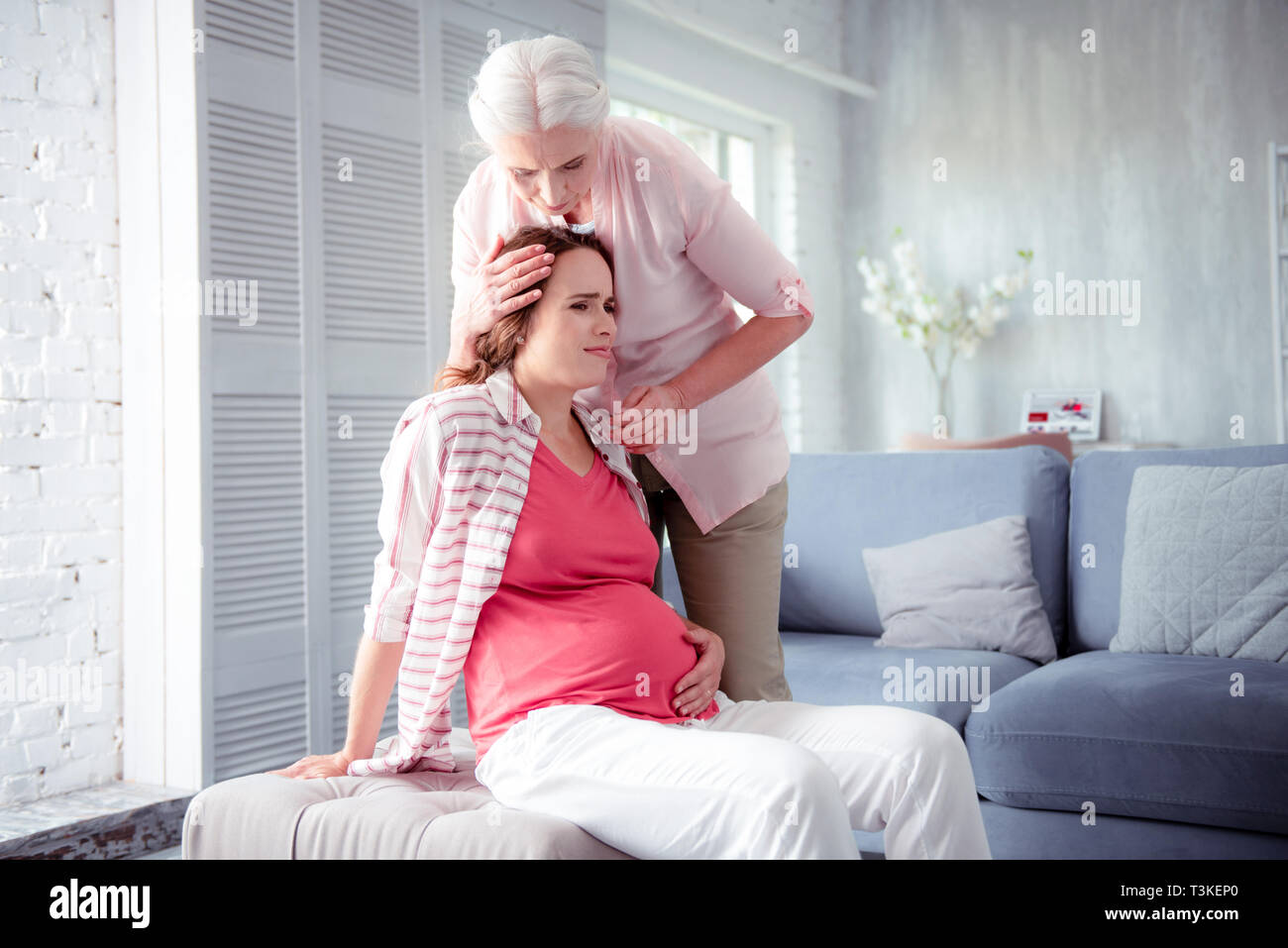Supportive family pain hi-res stock photography and images - Alamy