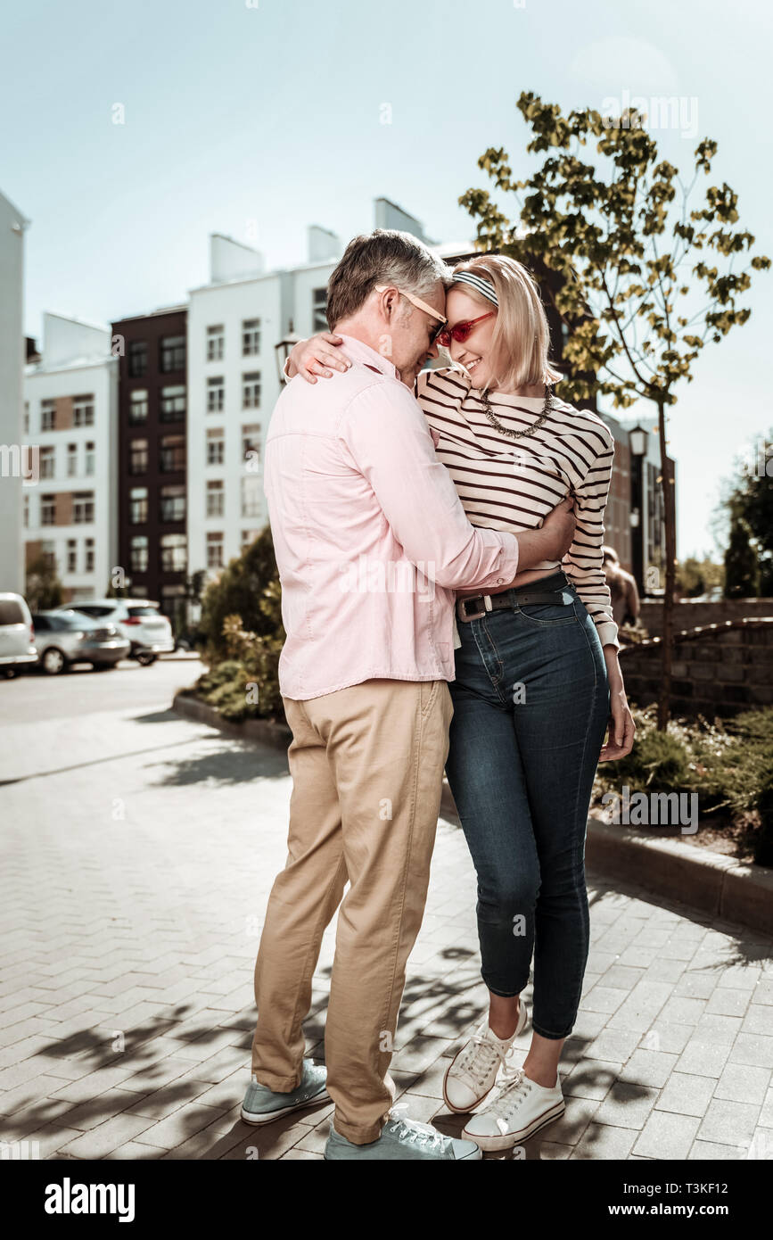 Happy young couple is having a nice time in october Stock Photo - Alamy