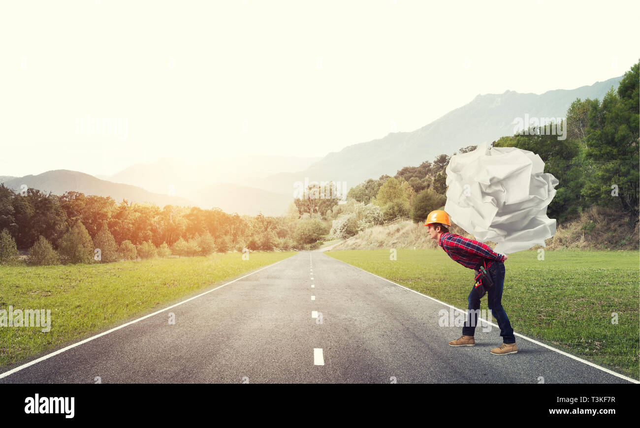 Engineer man carry load Stock Photo - Alamy
