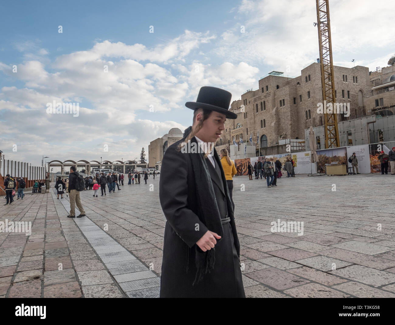 A Jewish man walks across the Western Wall Plaza in Jerusalem, Israel ...