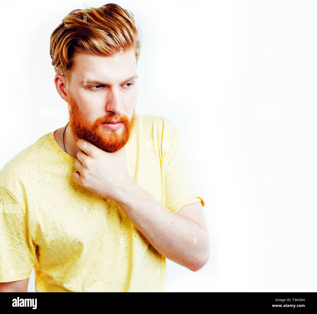 young handsome hipster ginger bearded guy looking brutal isolated on ...