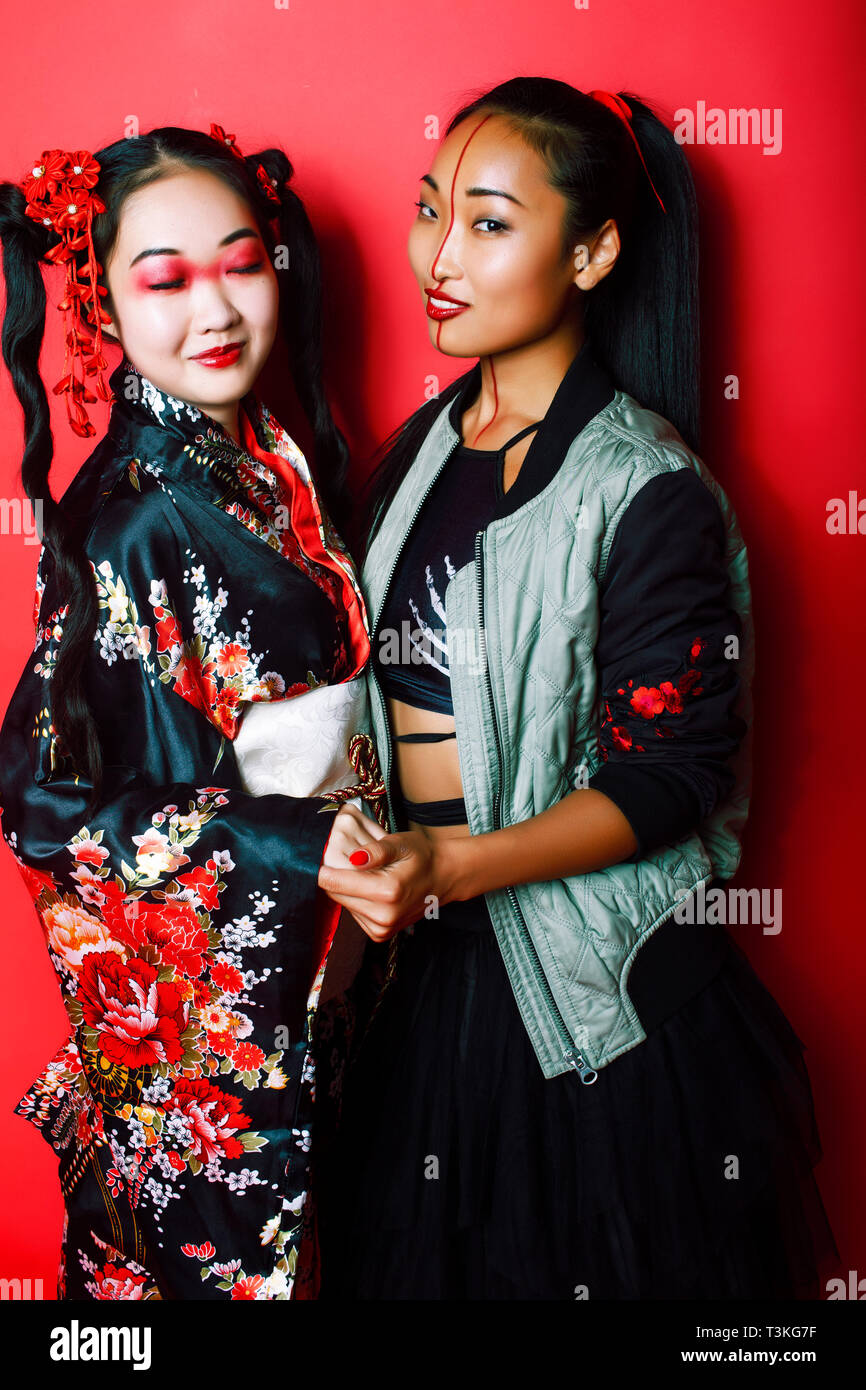two pretty geisha girls friends: modern asian woman and traditional ...