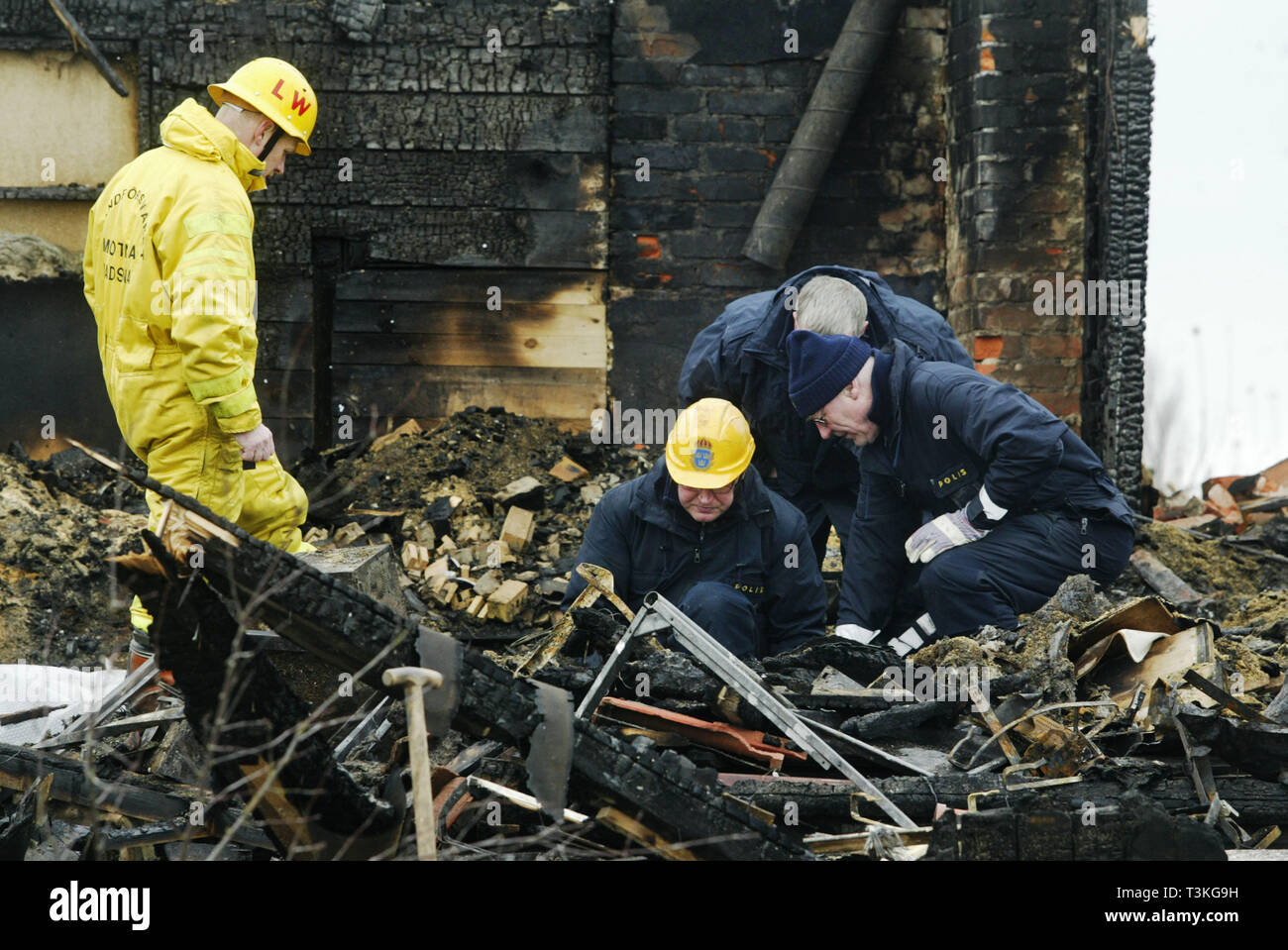 Fire investigator at a fire site Stock Photo - Alamy
