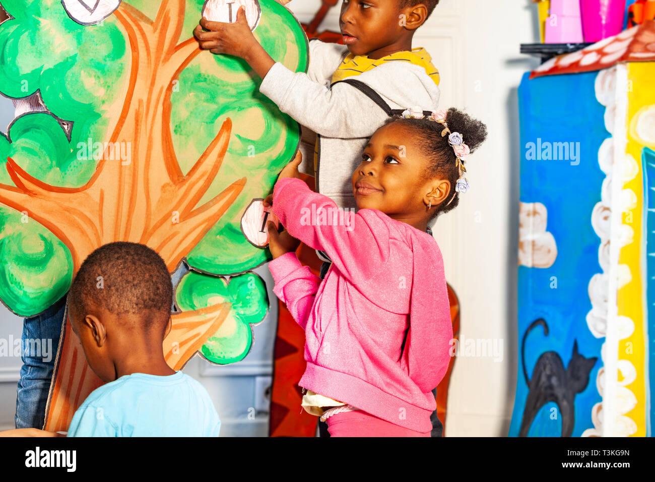 Group Of Kids Put Letters On The Tree In Nursery Stock Photo Alamy group-of-kids-put-letters-on-the-tree-in-nursery-stock-photo-alamy