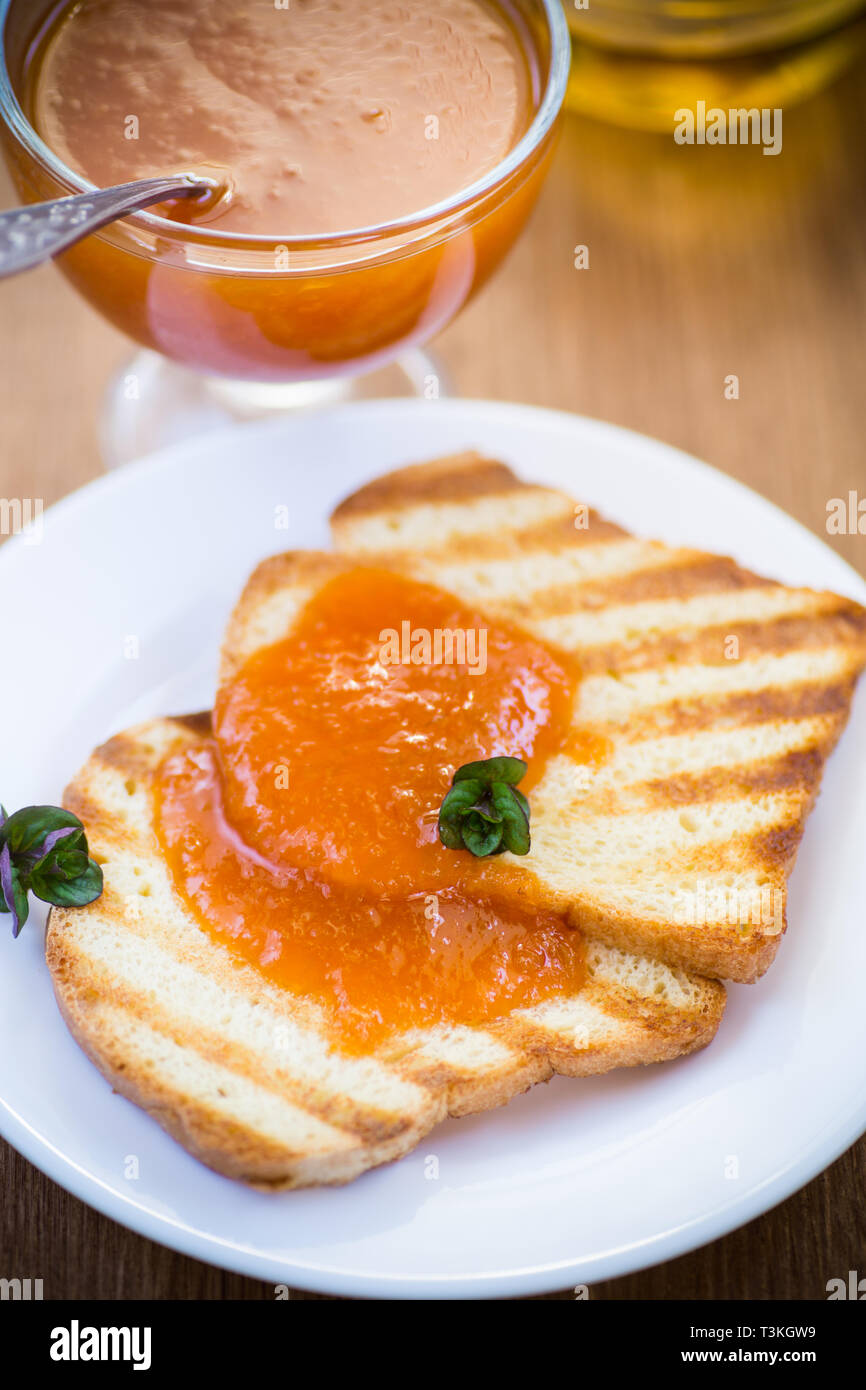 fried toast with apricot jam in a plate Stock Photo - Alamy