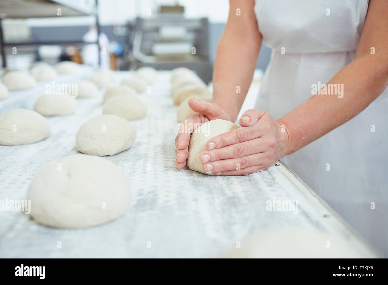 Baking hands hi-res stock photography and images - Alamy