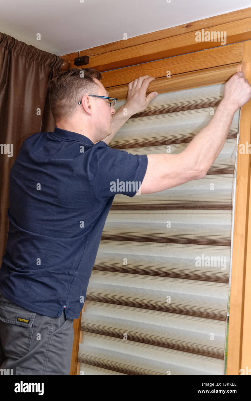 Installing blinds hi-res stock photography and images - Alamy