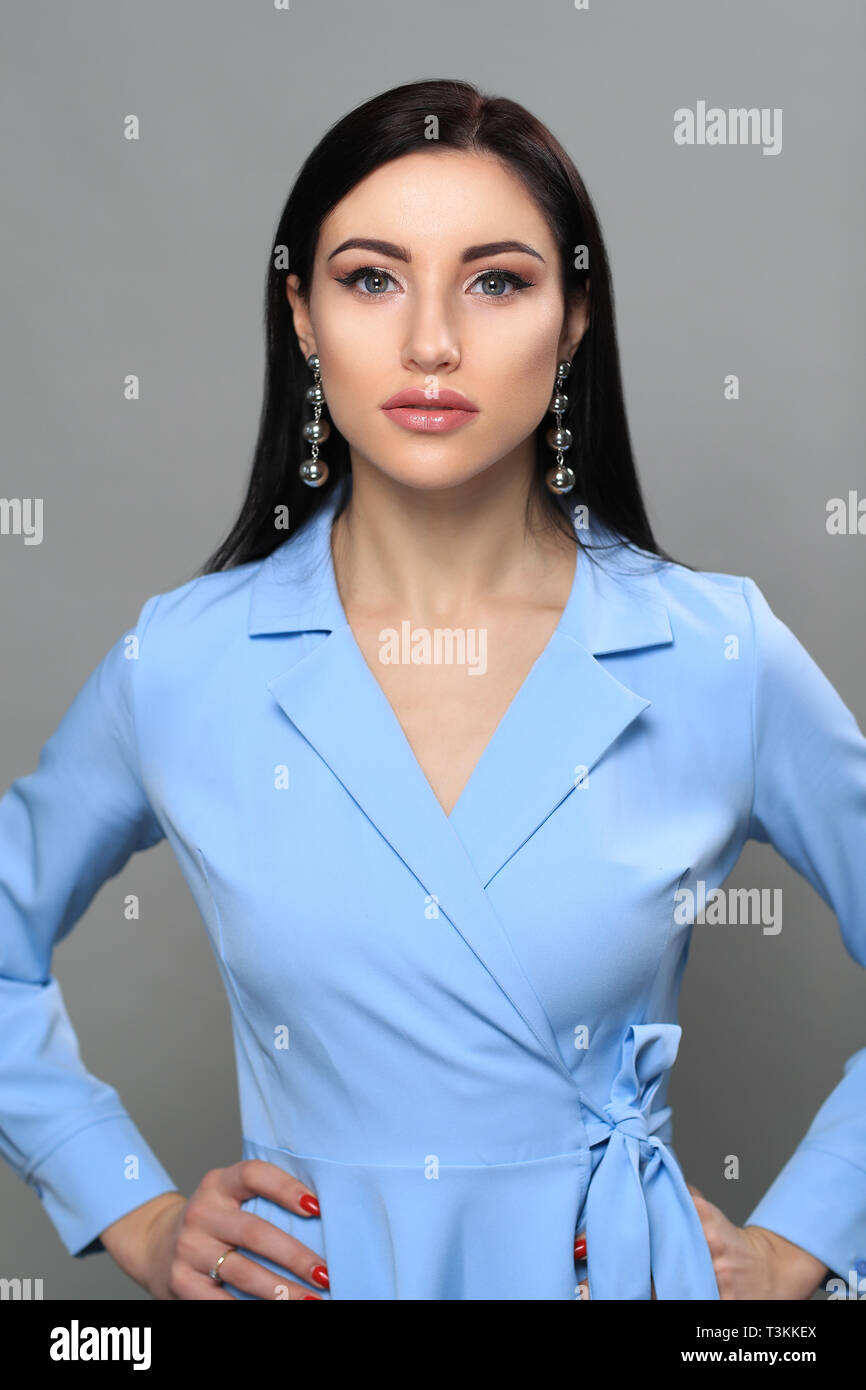 Woman in blue dress Stock Photo - Alamy