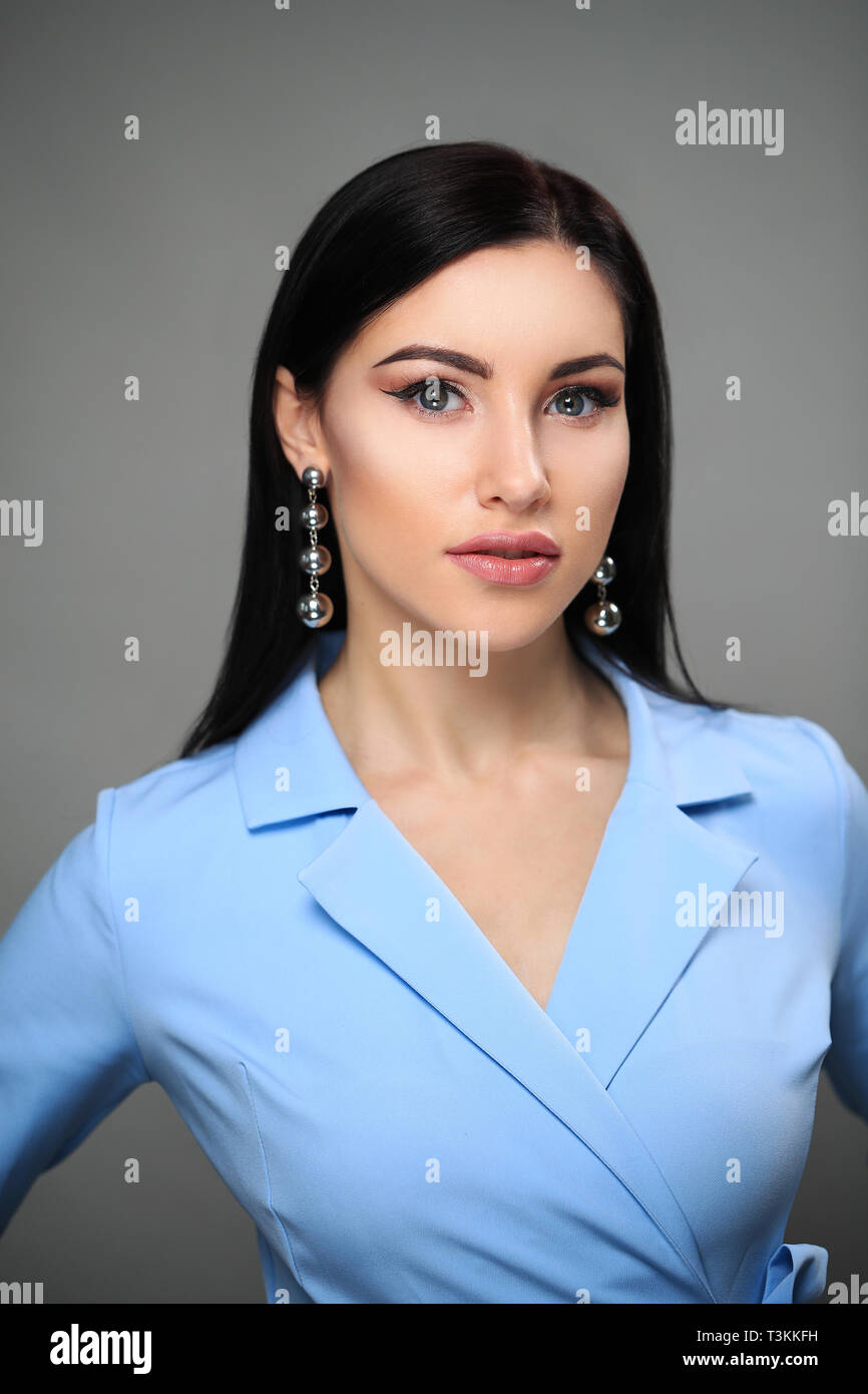 Woman in blue dress Stock Photo - Alamy